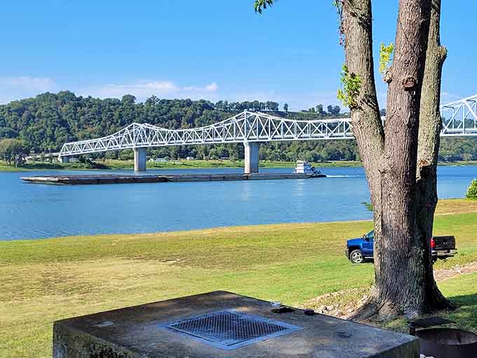 The bridge spanning the river connects two states and countless stories of travelers who've crossed these waters before.