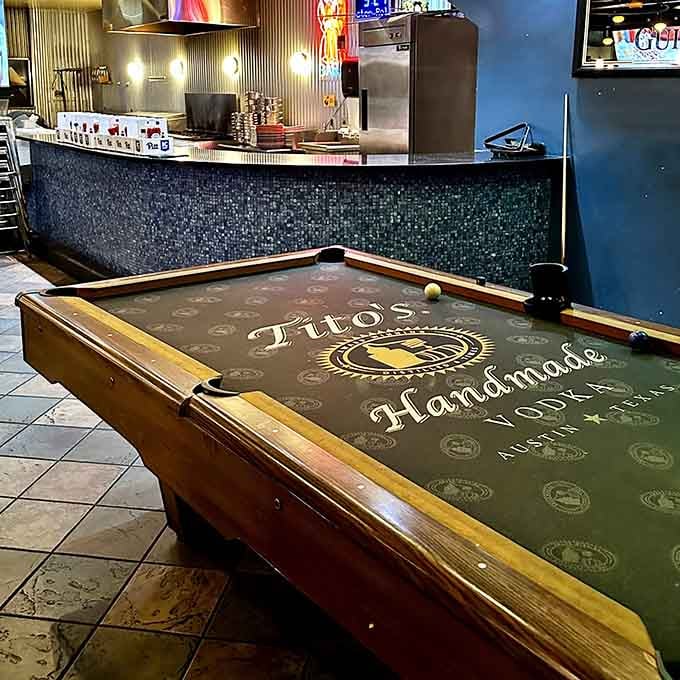 Even Tito's Vodka approves of this billiard table, because sometimes you need entertainment between courses of seafood.