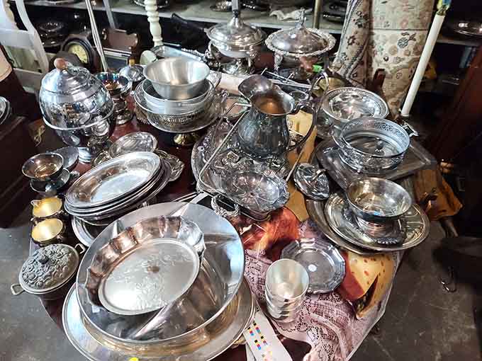 Gleaming silverware and serving pieces catch the light, ready to elevate your next dinner party to fancy status.