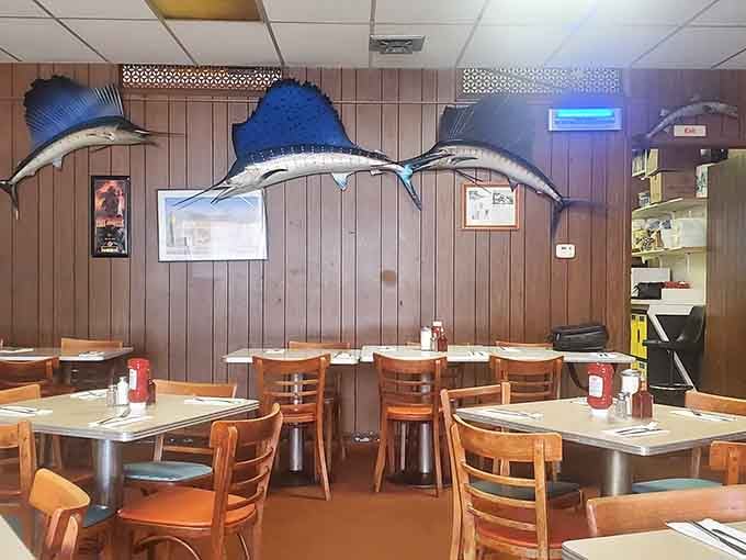 Sailfish on the walls watch over diners like benevolent guardians of the fried fish tradition and legacy.