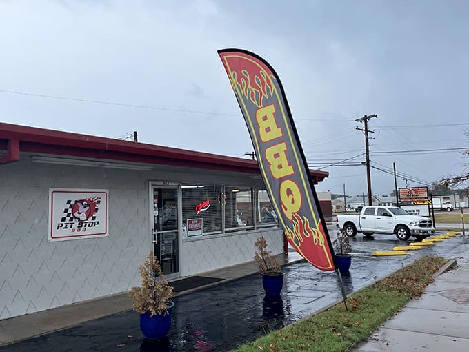 Pit Stop BBQ waves you in with promises of smoky goodness that'll make your taste buds sing.