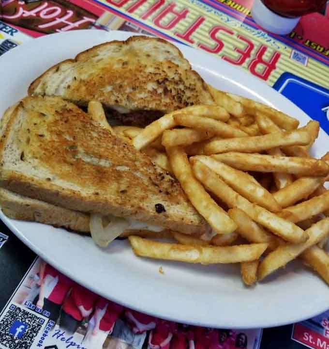 The patty melt on grilled rye with a mountain of fries, simple perfection that's been pleasing crowds for generations.