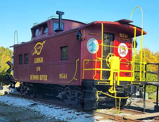This restored Lehigh and Hudson River caboose sits proudly on display, looking better than most people's actual commuter trains today.