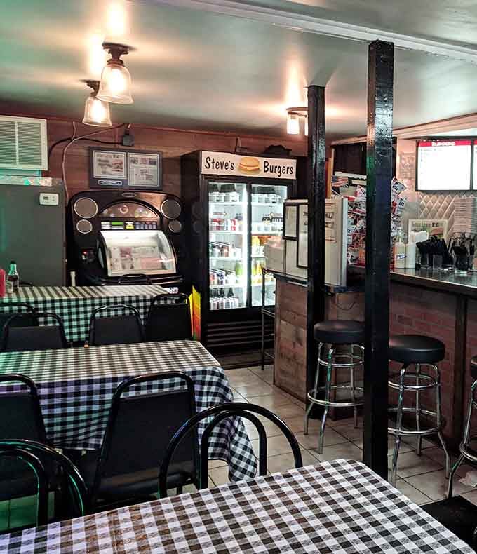 Wood paneling, vintage coolers, and counter seating prove that sometimes the best dining rooms are the simplest ones.