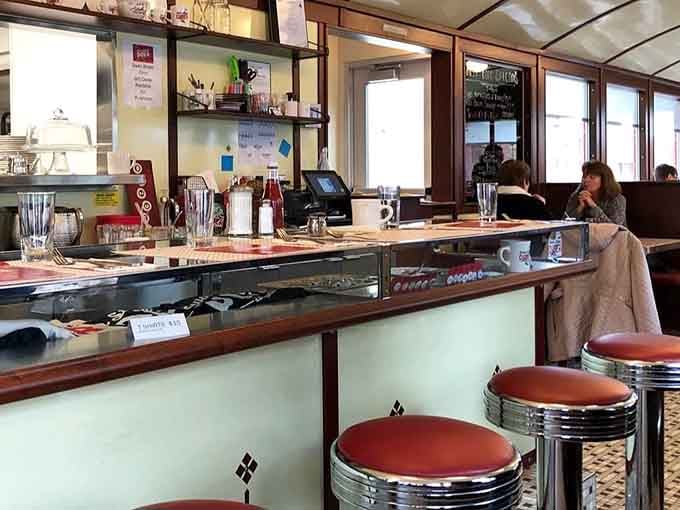 The long counter with those spinning stools offers front-row seats to watch breakfast magic happen before your eyes.