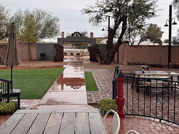 Rain-slicked pathways leading to the barn entrance look like something from a Hallmark movie set scene.