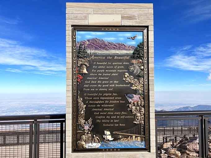 The "America the Beautiful" plaque reminds you that this view literally inspired patriotic poetry, no pressure on your Instagram captions.