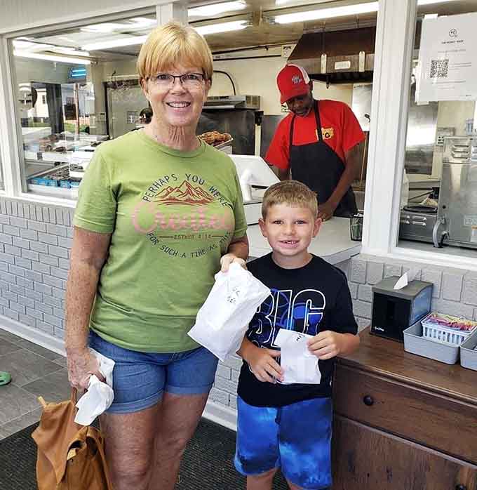 Happy customers leaving with their treasure, already planning tomorrow's return visit before reaching the parking lot.
