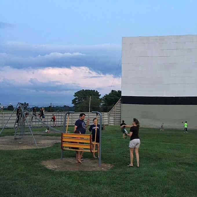 A playground for the kids means parents can actually relax before showtime, genius planning right there.