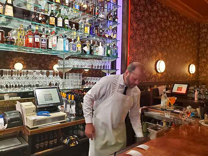 Behind every great steakhouse is a bartender who knows that a proper martini requires skill, not just ingredients.