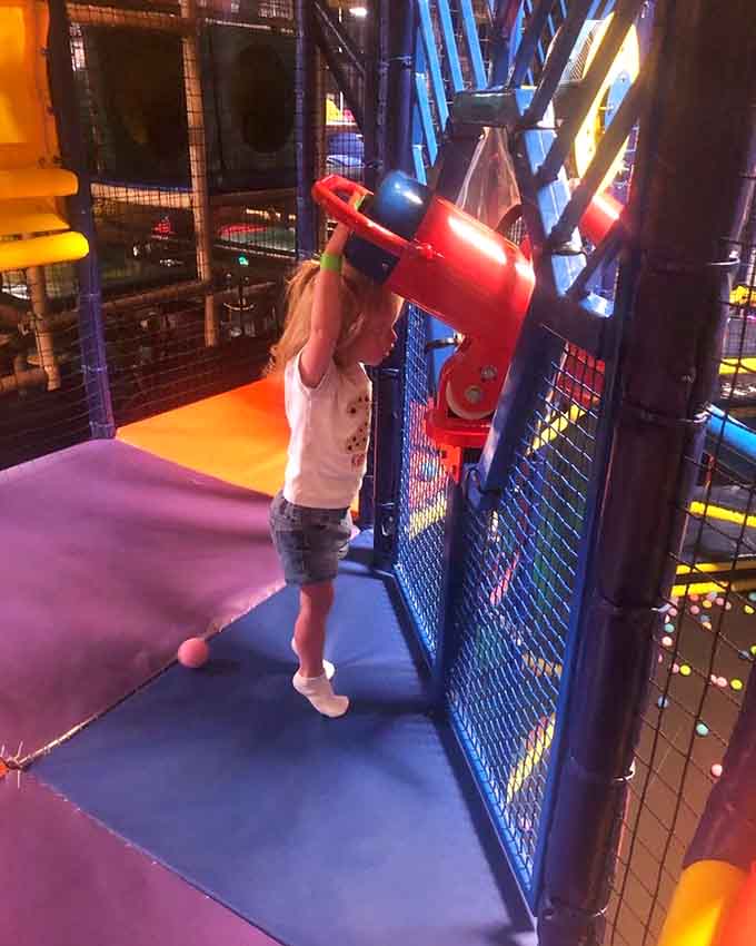 Watch kids navigate padded rollers like tiny adventurers conquering the world's bounciest mountain range one step at a time.