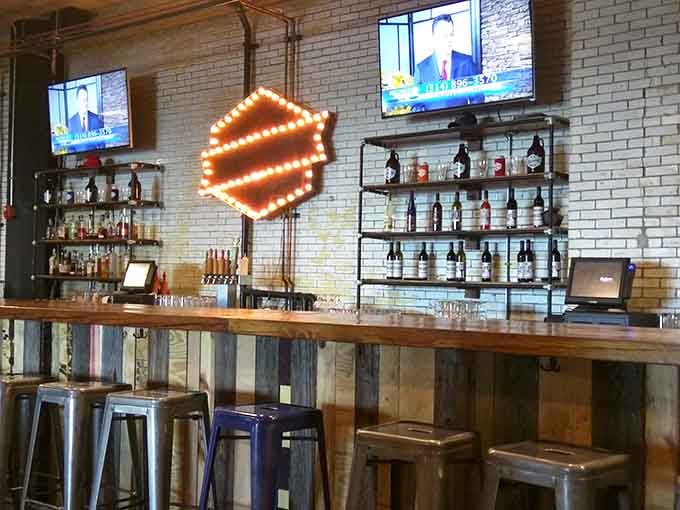 The bar beckons with that illuminated sign and rows of taps promising liquid adventures for every palate and preference under the sun.
