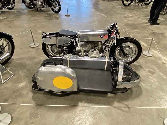 That vintage sidecar setup looks ready to recreate scenes from every World War II movie ever made.