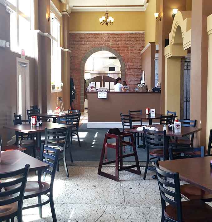 The exposed brick archway and spacious layout make you forget you're dining in small-town Illinois entirely.