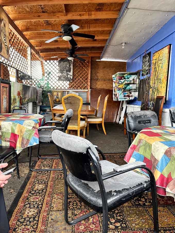 Mismatched chairs and colorful tablecloths create an atmosphere that feels like Sunday dinner at a favorite aunt's house.