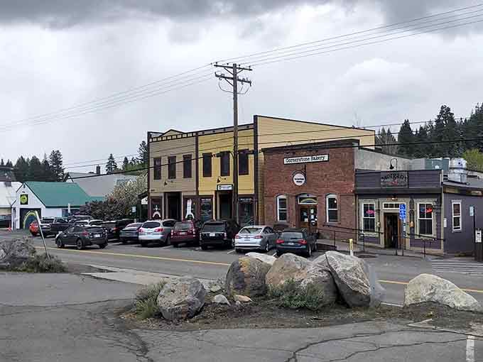 Downtown storefronts blend old brick with mountain practicality, shopping without the soul-crushing mall fluorescent lighting experience.