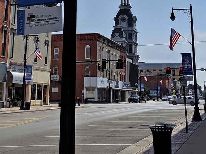 That courthouse tower has been the town's landmark for generations, visible from blocks away like a beacon.