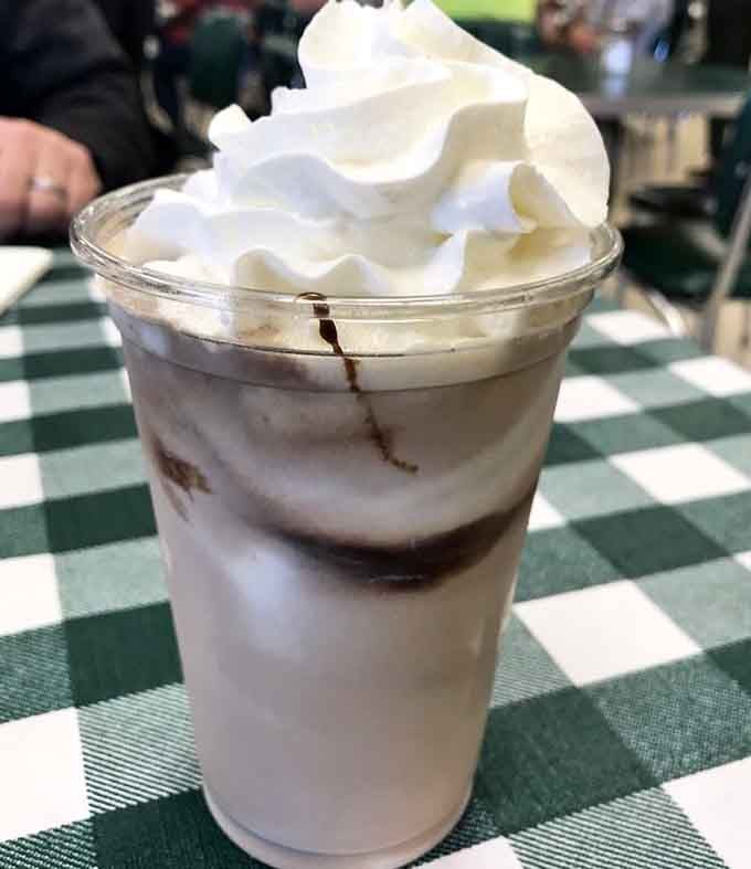 Chocolate malt topped with whipped cream because sometimes adulting means ordering dessert drinks for lunch.