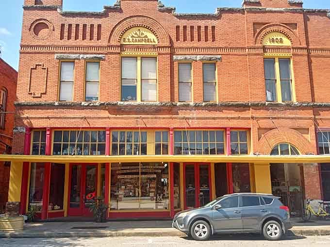 This storefront's ornate brickwork and arched windows showcase the craftsmanship that made downtown buildings worth preserving for future generations to enjoy.