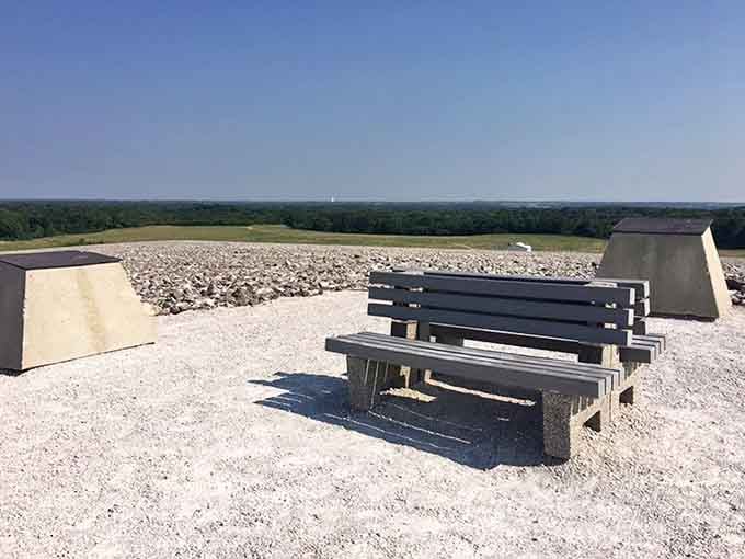 Benches at the summit offer front-row seats to sweeping vistas where you'd never guess what lies beneath your feet.