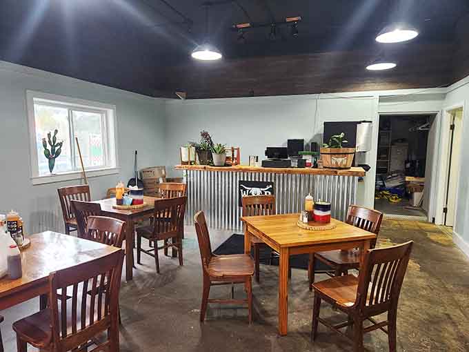 Mismatched chairs and wooden tables create that comfortable vibe where everyone's welcome at the barbecue table.