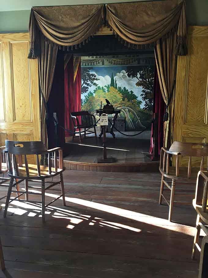 The stage where 19th-century performers once took their bows, and where phantom applause occasionally interrupts the silence even now.