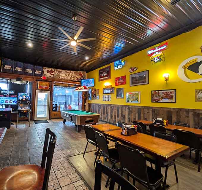 Another angle reveals the pool table and Cardinals pride, because Missouri knows how to do sports bars right.