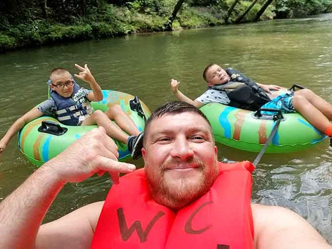 Family bonding done right: dad and kids creating memories that'll outlast any video game or screen time.
