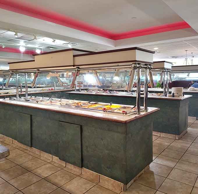 Miles of buffet stations stretch before you like a delicious obstacle course designed to test your decision-making abilities.