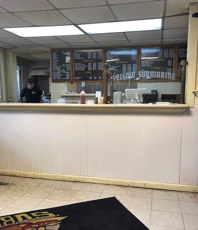 The order counter where magic happens, transforming simple ingredients into meals that fuel both body and Beatles nostalgia.