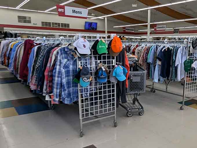Men's clothing hangs organized and ready, because looking sharp shouldn't cost a fortune or require loans.
