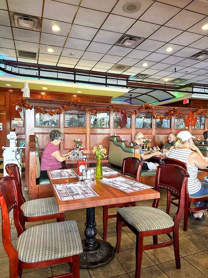 Diners enjoy their meals in the spacious main dining area, complete with comfortable booths and that welcoming diner atmosphere.