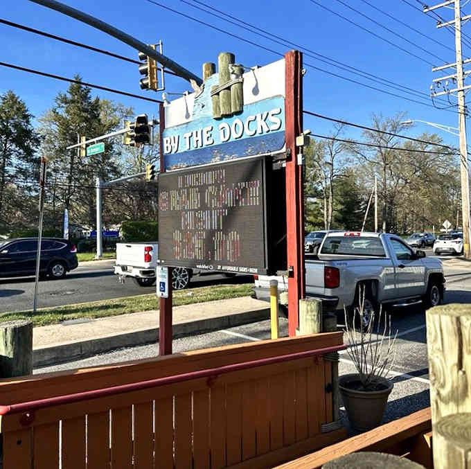 That dock sculpture on the sign isn't just decoration – it's a promise of the fresh, delicious treasures waiting inside.