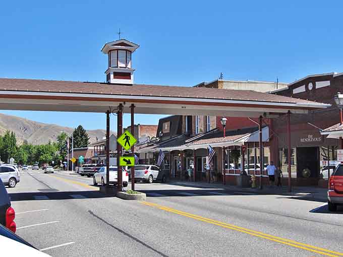 Mountain backdrop meets small-town charm where the architecture whispers stories of simpler times and sweeter days.