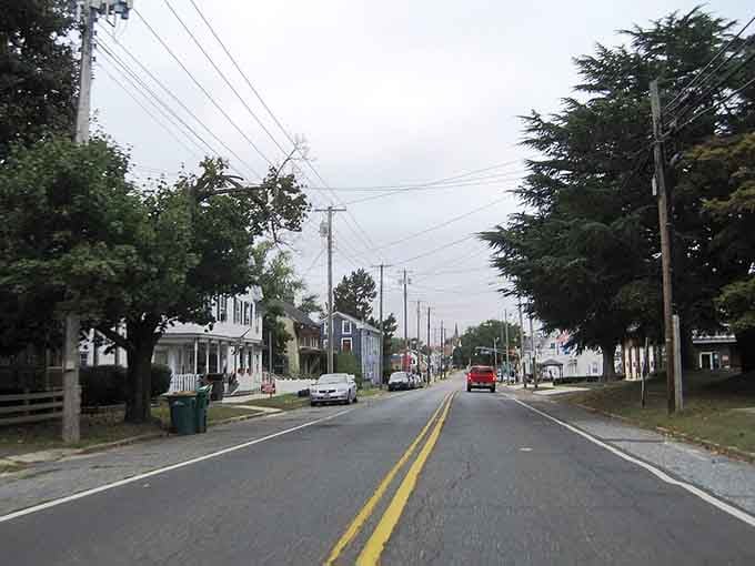 Tree-lined streets curve gently past modest homes where the loudest sound is probably someone mowing their perfectly striped lawn.