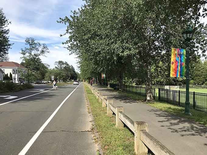 Tree-lined paths and open green spaces invite leisurely strolls through this welcoming neighborhood.