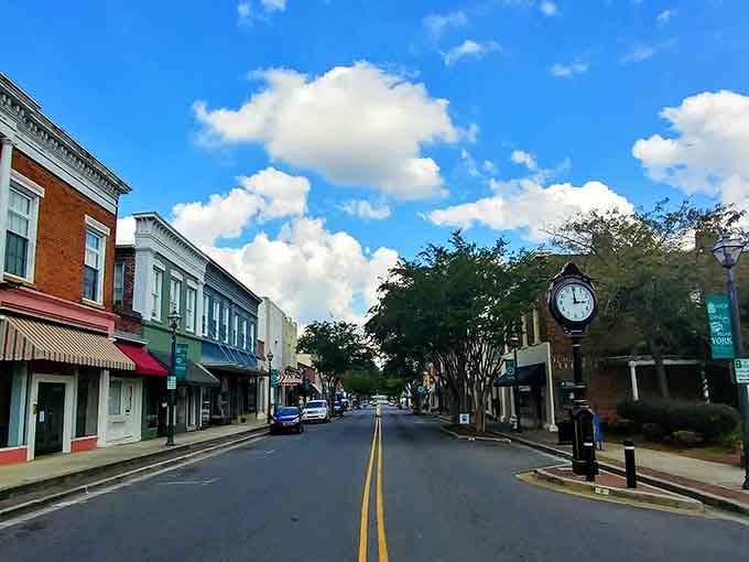 Main Street stretches ahead with historic storefronts and that distinctive clock tower standing watch over everything.