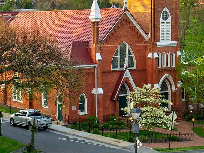 Spring blossoms frame this beautiful sanctuary where steeples point heavenward and history lives in every handcrafted detail.