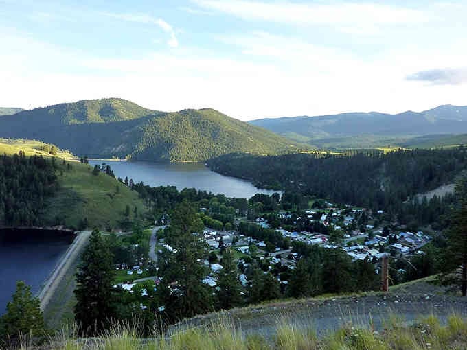 Rolling hills cradle this lakeside community like a secret hideaway where time moves at a gentler, kinder pace.