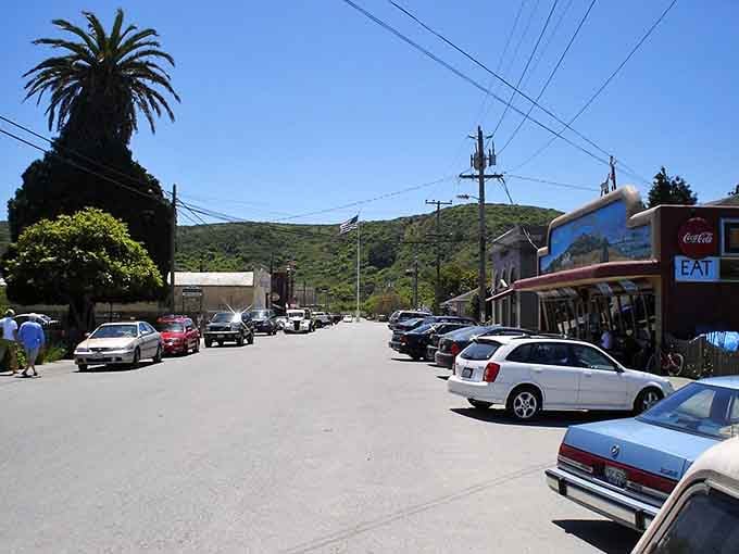 Coastal mountains loom behind this laid-back street, where the ocean breeze keeps everything cool and comfortable year-round.