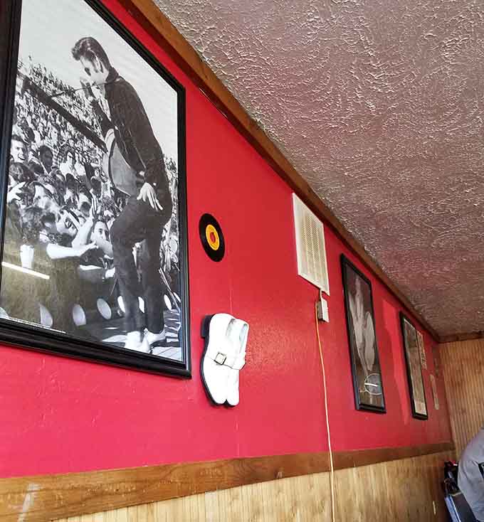 Vintage photographs and vinyl records on crimson walls transport you straight back to when Elvis ruled the airwaves nationwide.