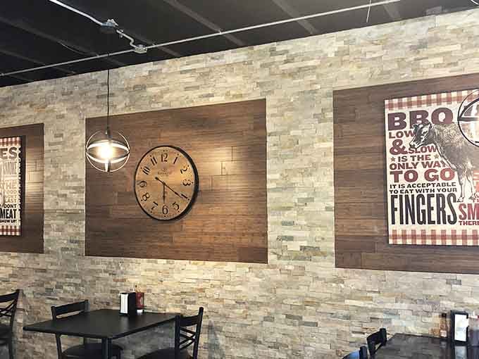 Playful wall art reminds diners that eating barbecue with your fingers isn't just acceptable, it's practically mandatory.