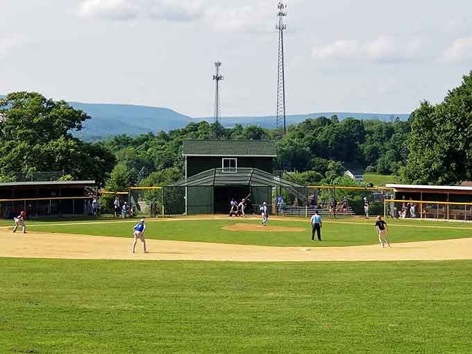 Baseball fields with mountain views beat sterile stadiums every single time; this is how the game was meant to be played.