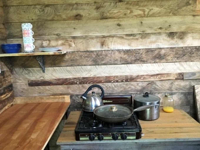 A simple camp stove setup proves you don't need fancy appliances when you're living the simple hobbit life.