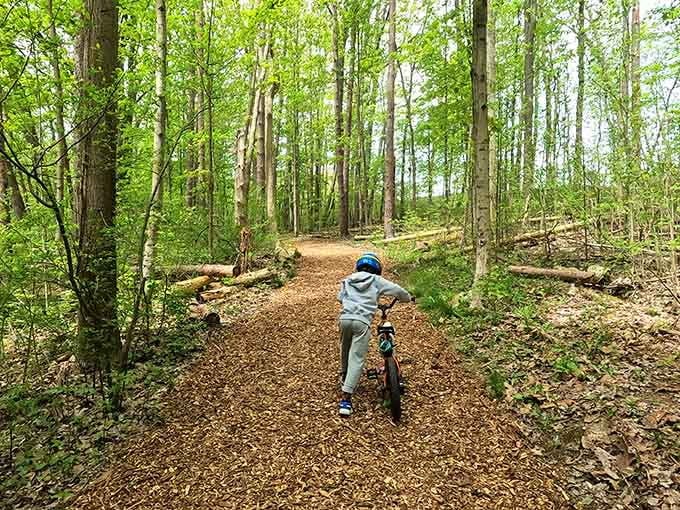 Little explorer discovering that the best playground equipment is actually just a dirt path and endless possibility for adventure.