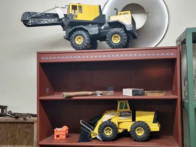 Tonka trucks that survived actual childhoods now wait patiently for collectors who remember when toys were built like tiny tanks.