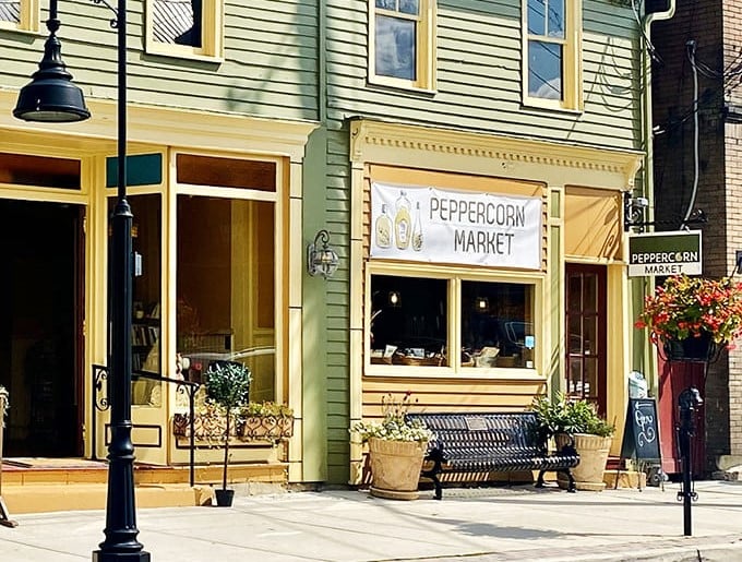 Peppercorn Market's cheerful yellow facade promises gourmet discoveries that'll elevate your next home-cooked meal significantly.