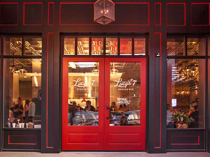 Lucy's #7 Burger Bar's bold red doors practically beg you to come inside for comfort food done right.