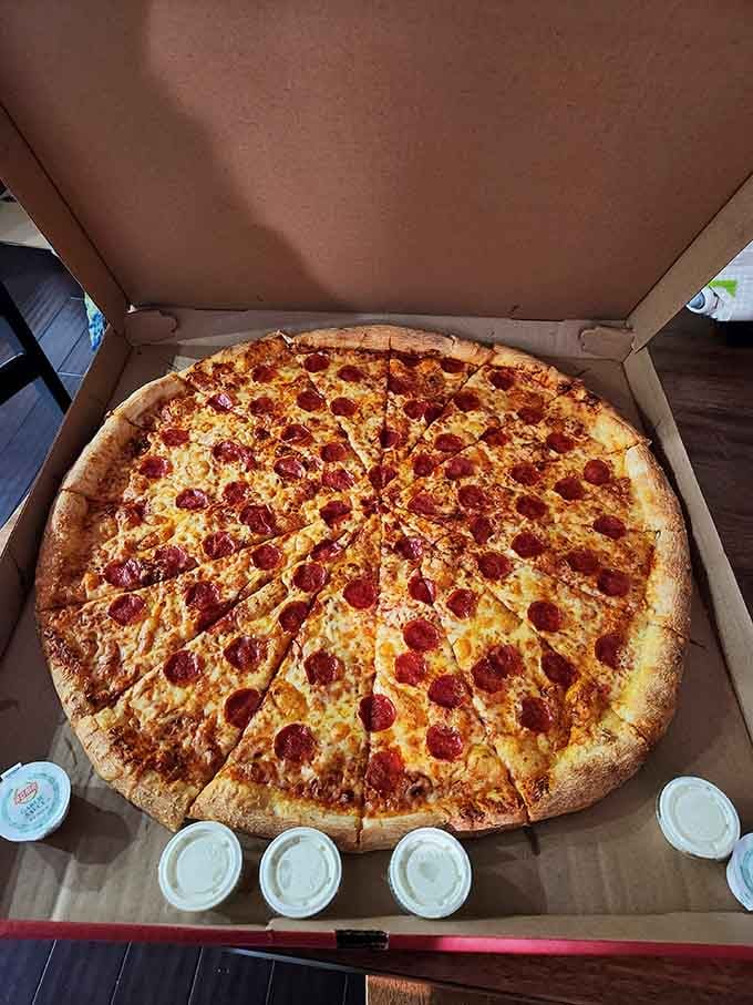 This whole pepperoni pizza comes with side cups of ranch because you'll need reinforcements for this carb expedition.
