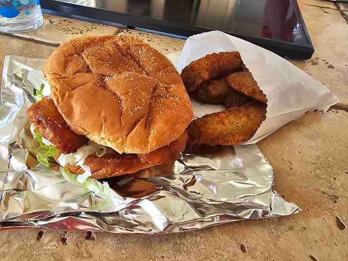 Crispy fish sandwich with golden breaded fillets proves Big Bubba's mastery extends beyond beef into seafood territory too.